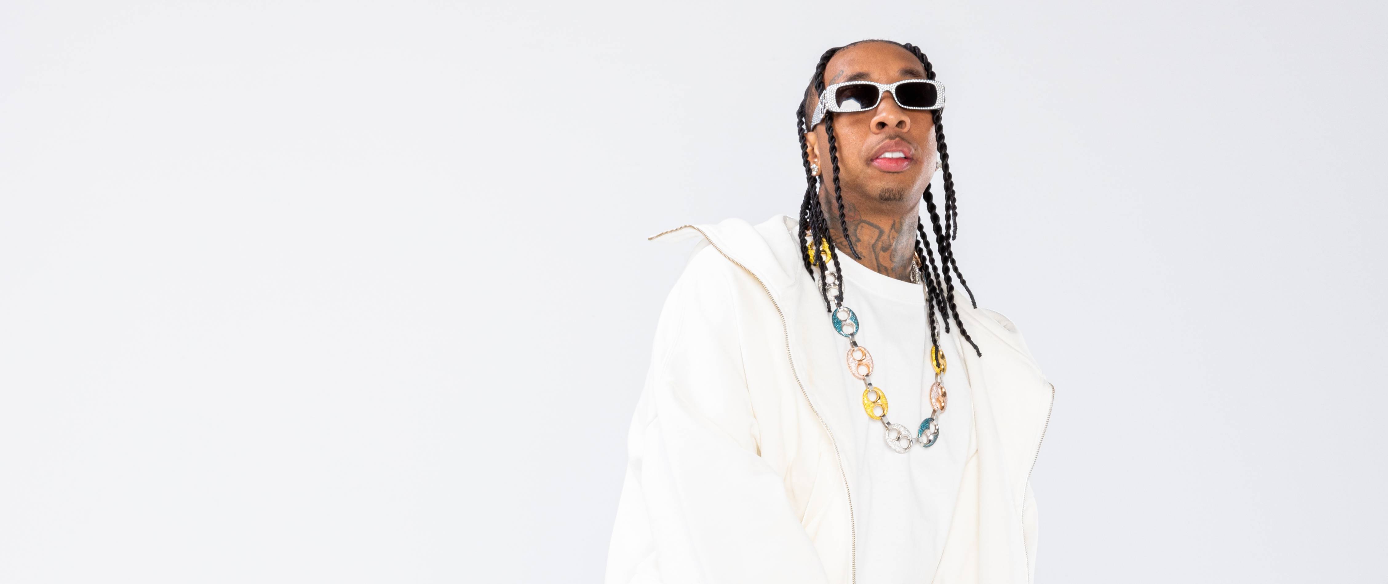 Tyga In White Coat