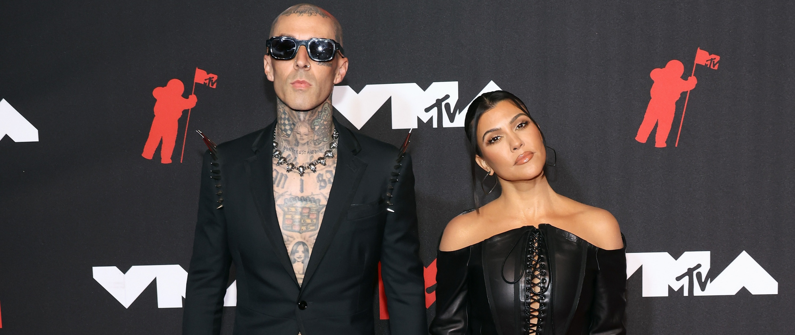 Kourtney Kardashian & Travis Barker: Iconic Punk Rock Style