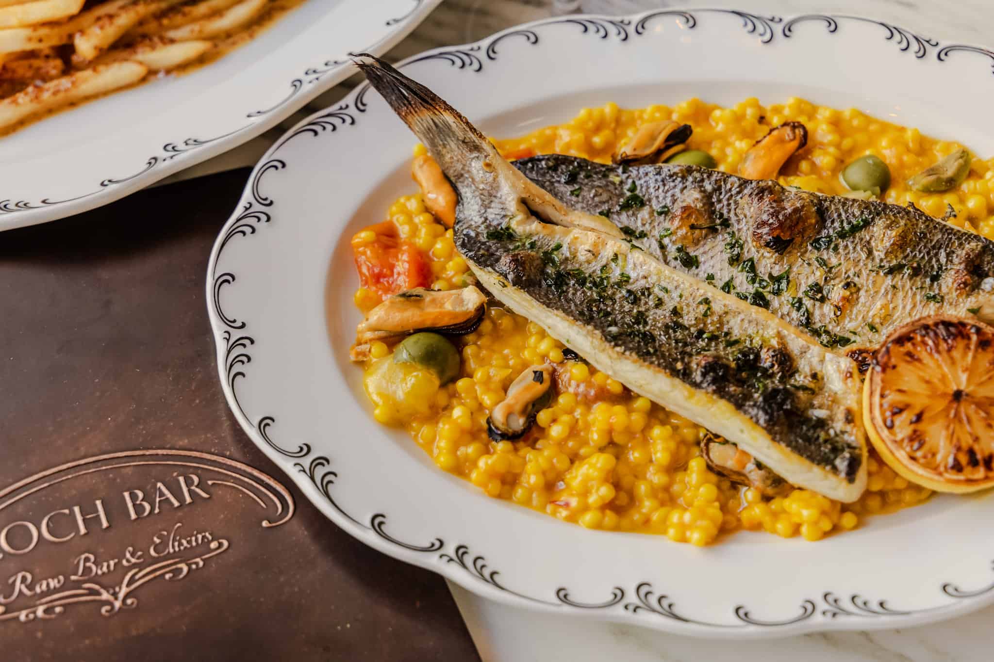 Loch Bar: Coastal Cuisine & Live Energy in Philadelphia